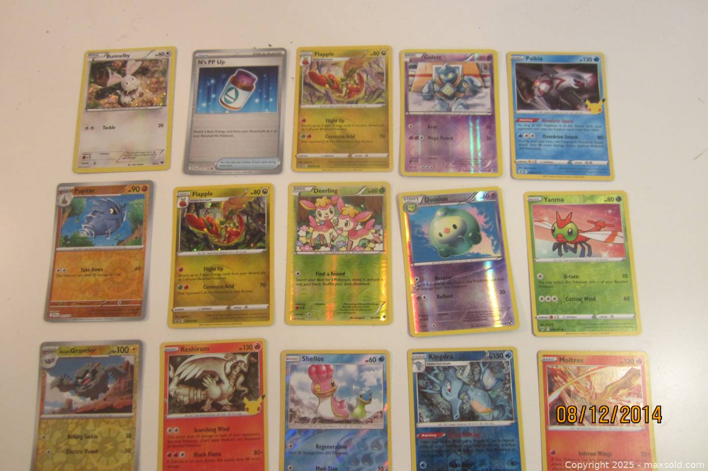 15 Pokémon holographic trading cards | Maxsold