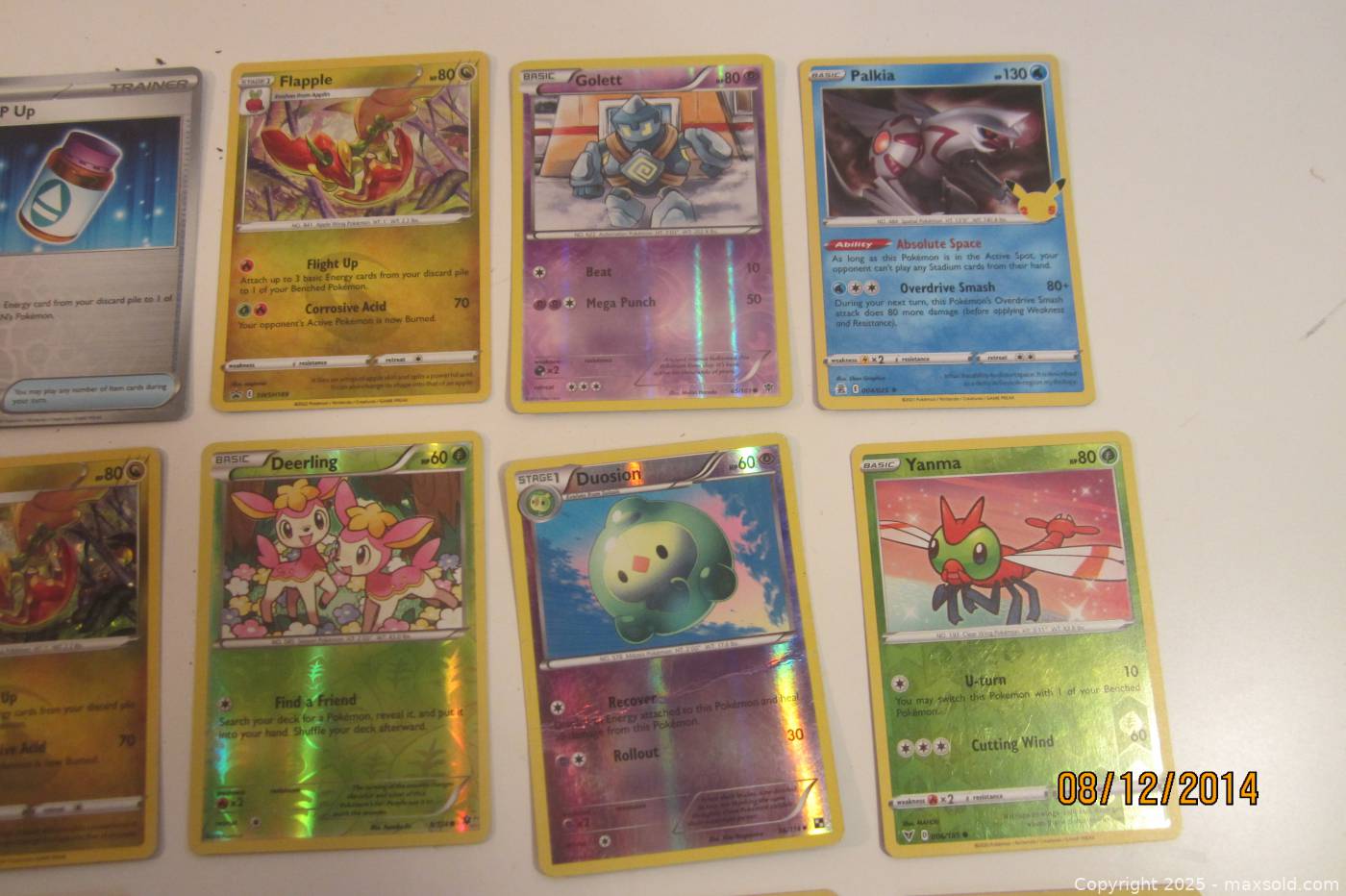 15 Pokémon holographic trading cards | Maxsold