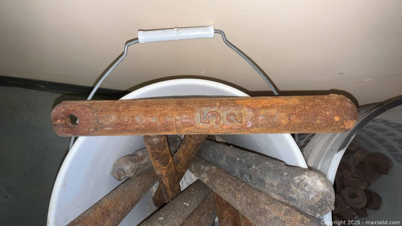 Two buckets cast iron window sash counterweights | Maxsold