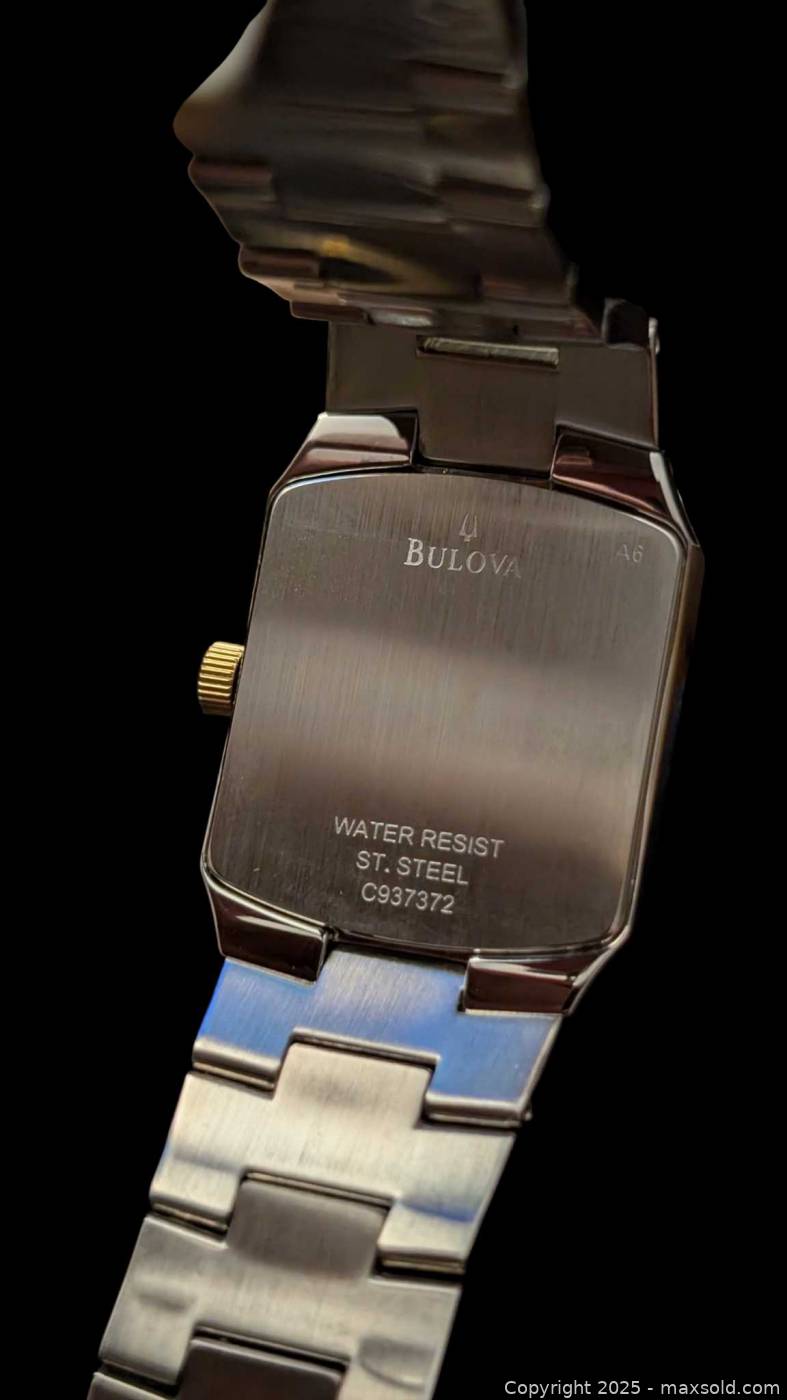 Bulova Solar-Powered Rectangular Watch with Box and Booklet | Maxsold