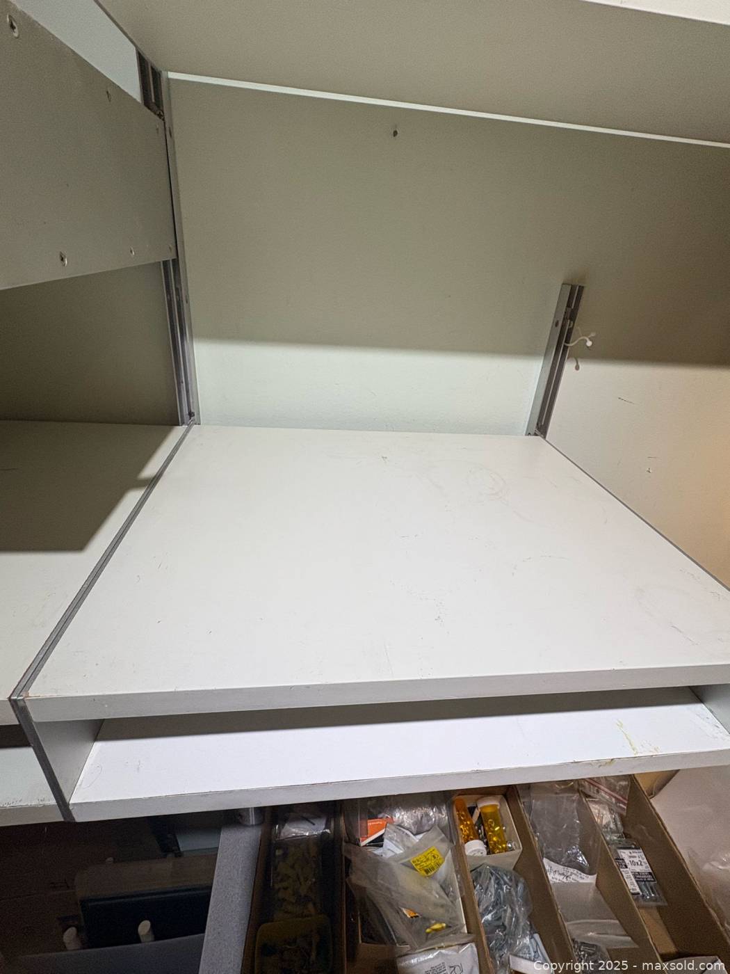 Vintage wall-mounted modular shelving system | Maxsold