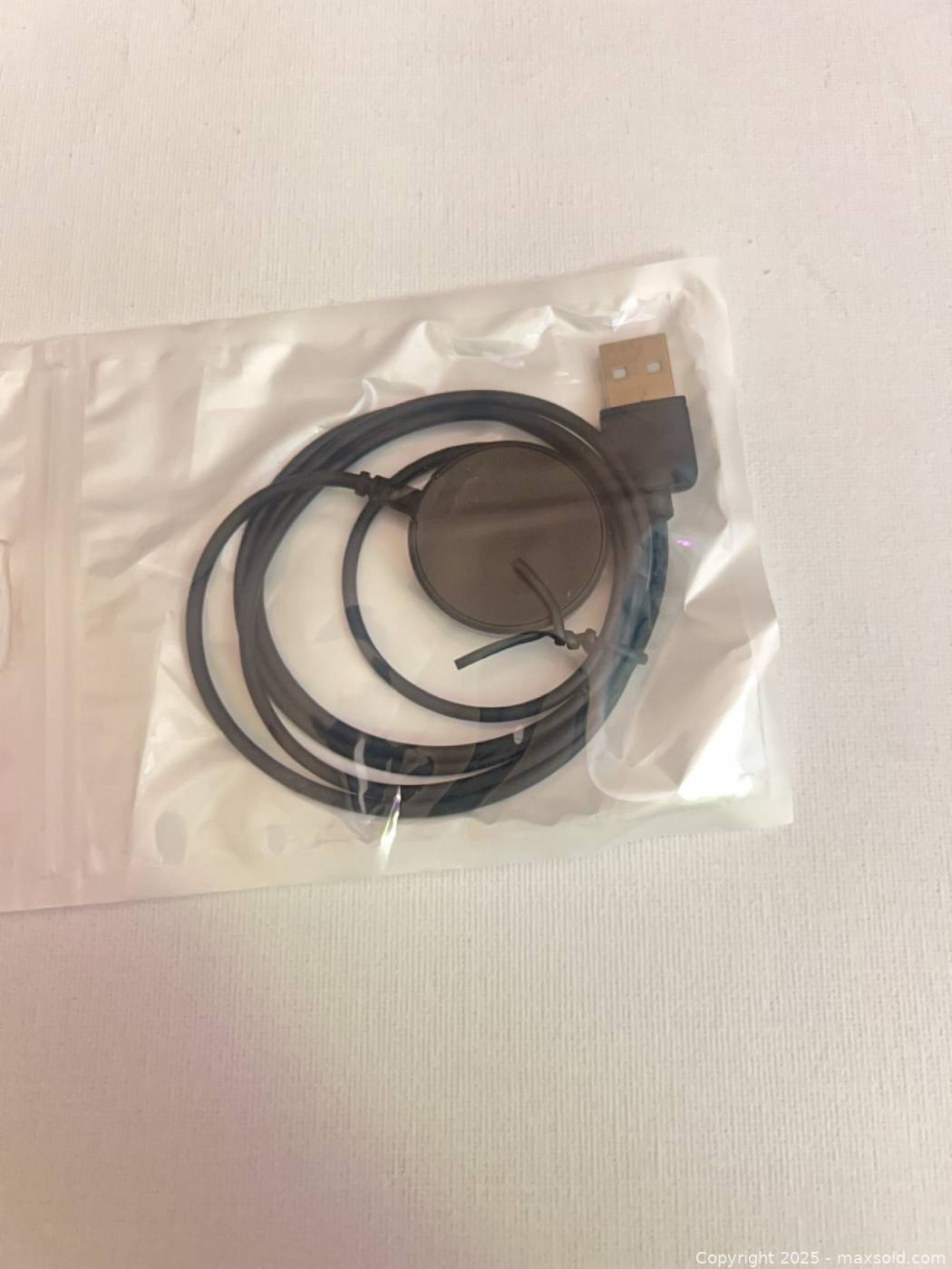 Magnetic USB-A to magnetic puck charging cable | Maxsold