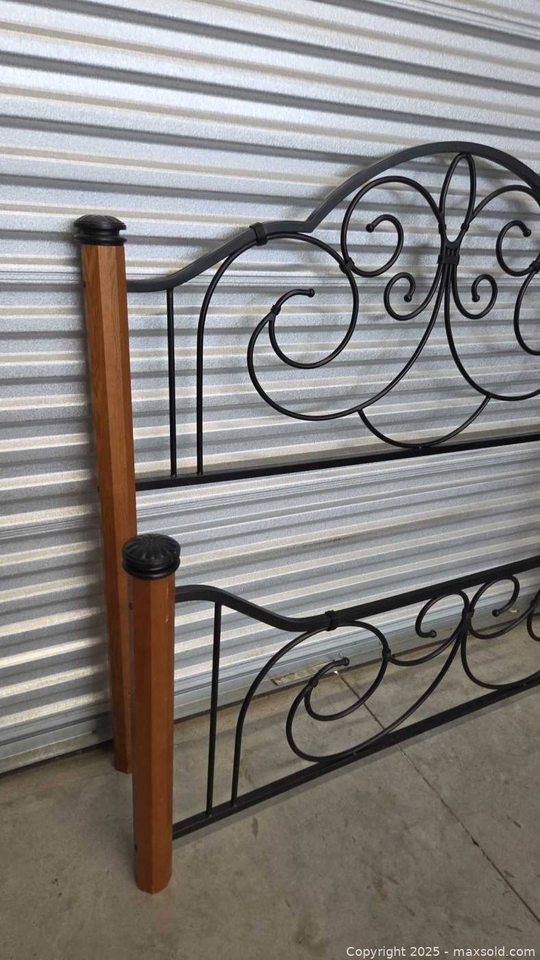 Metal scrollwork headboard and footboard with wood posts | Maxsold