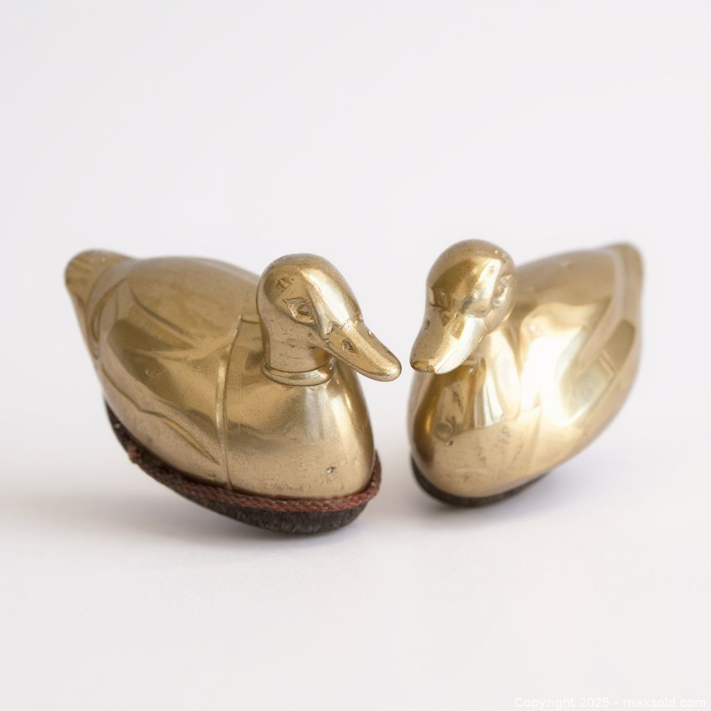 Pair of vintage brass duck figurines | Maxsold