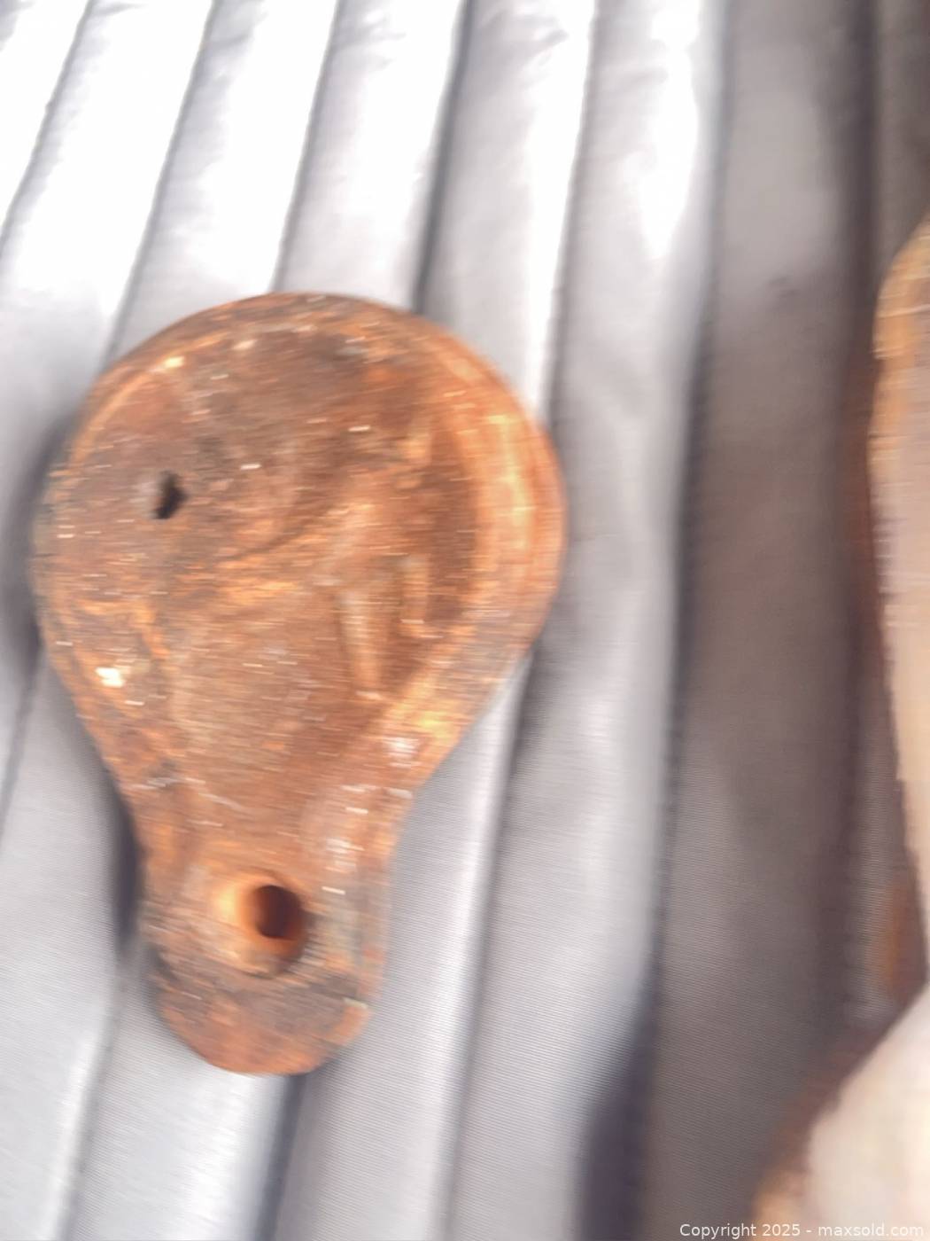 Hand-carved wood figure and clay idols | Maxsold