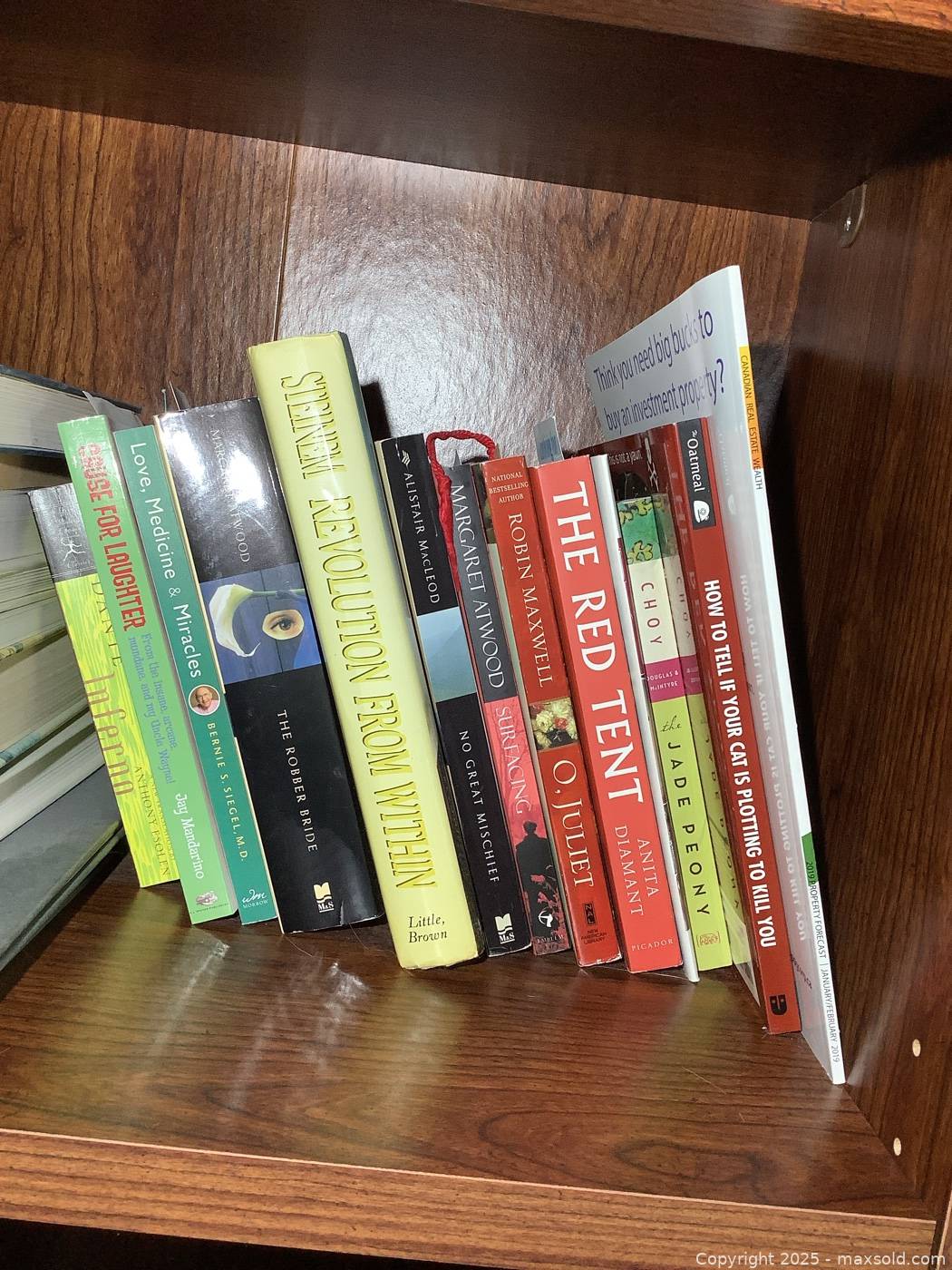 Books and DVDs with small rack | Maxsold