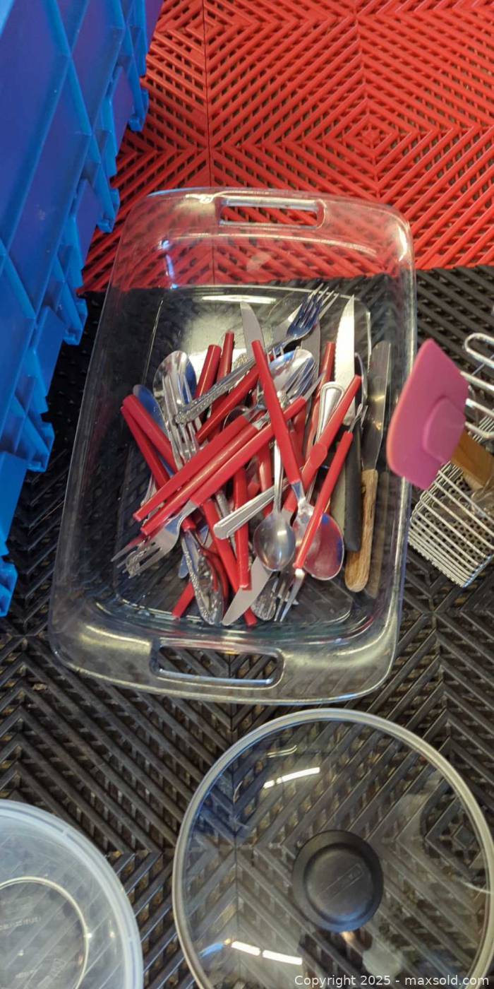 Assorted kitchenware: glassware, dinnerware, cutlery, utensils ...