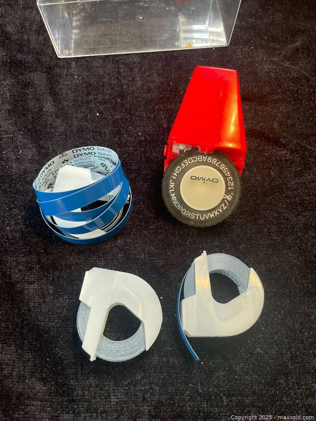 Vintage Dymo handheld label maker with 3 blue tape rolls | Maxsold