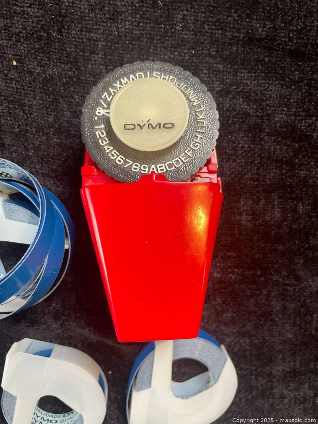 Vintage Dymo handheld label maker with 3 blue tape rolls | Maxsold