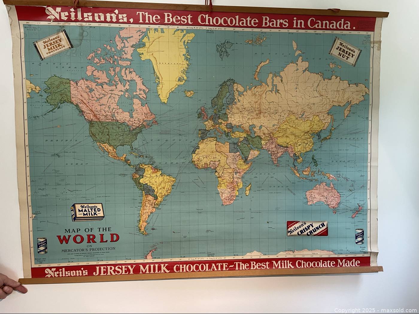 Vintage Neilson Map of the World roll-up wall map | Maxsold