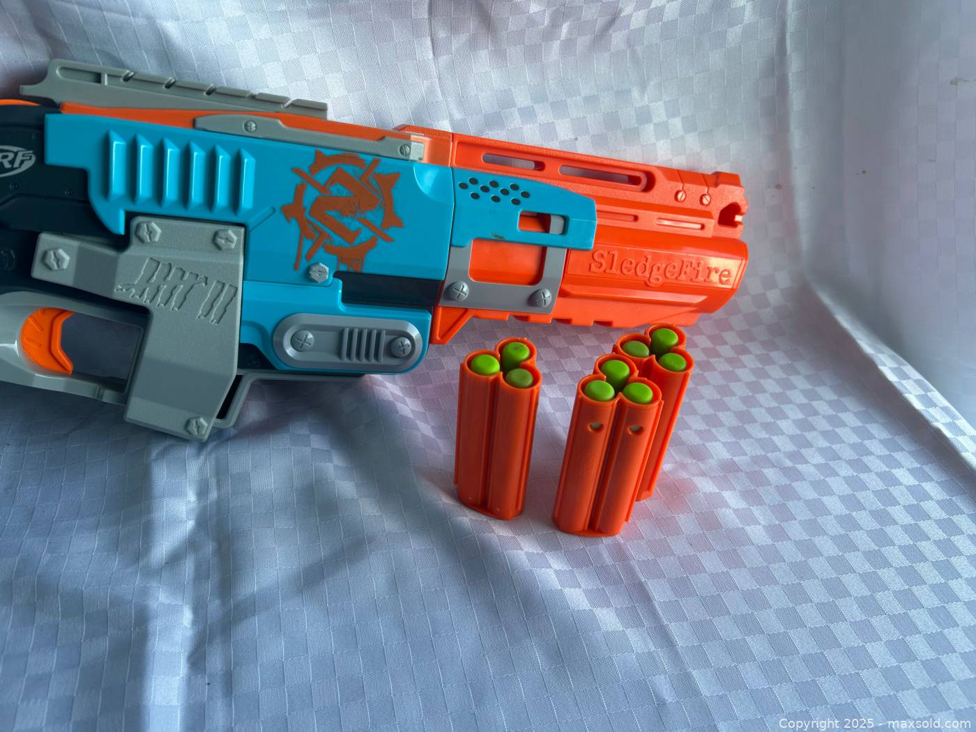 Nerf Zombie Strike Sledgefire blaster with 3 shells | Maxsold