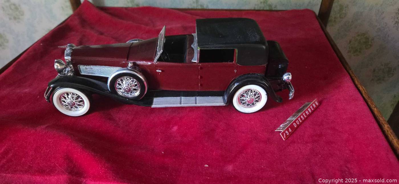 Vintage handmade model cars, books, needlepoint | Maxsold