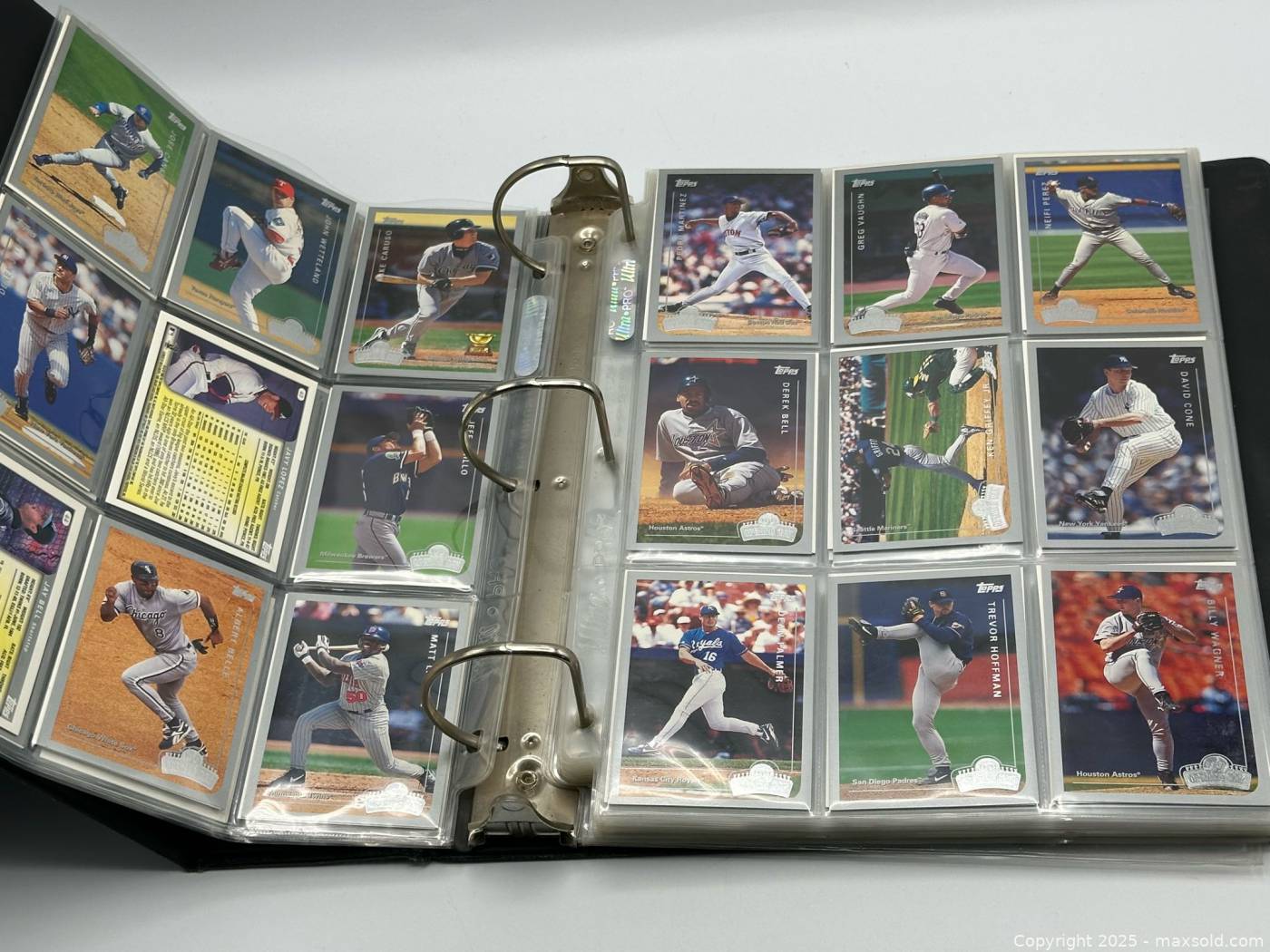Binder with assorted baseball cards | Maxsold