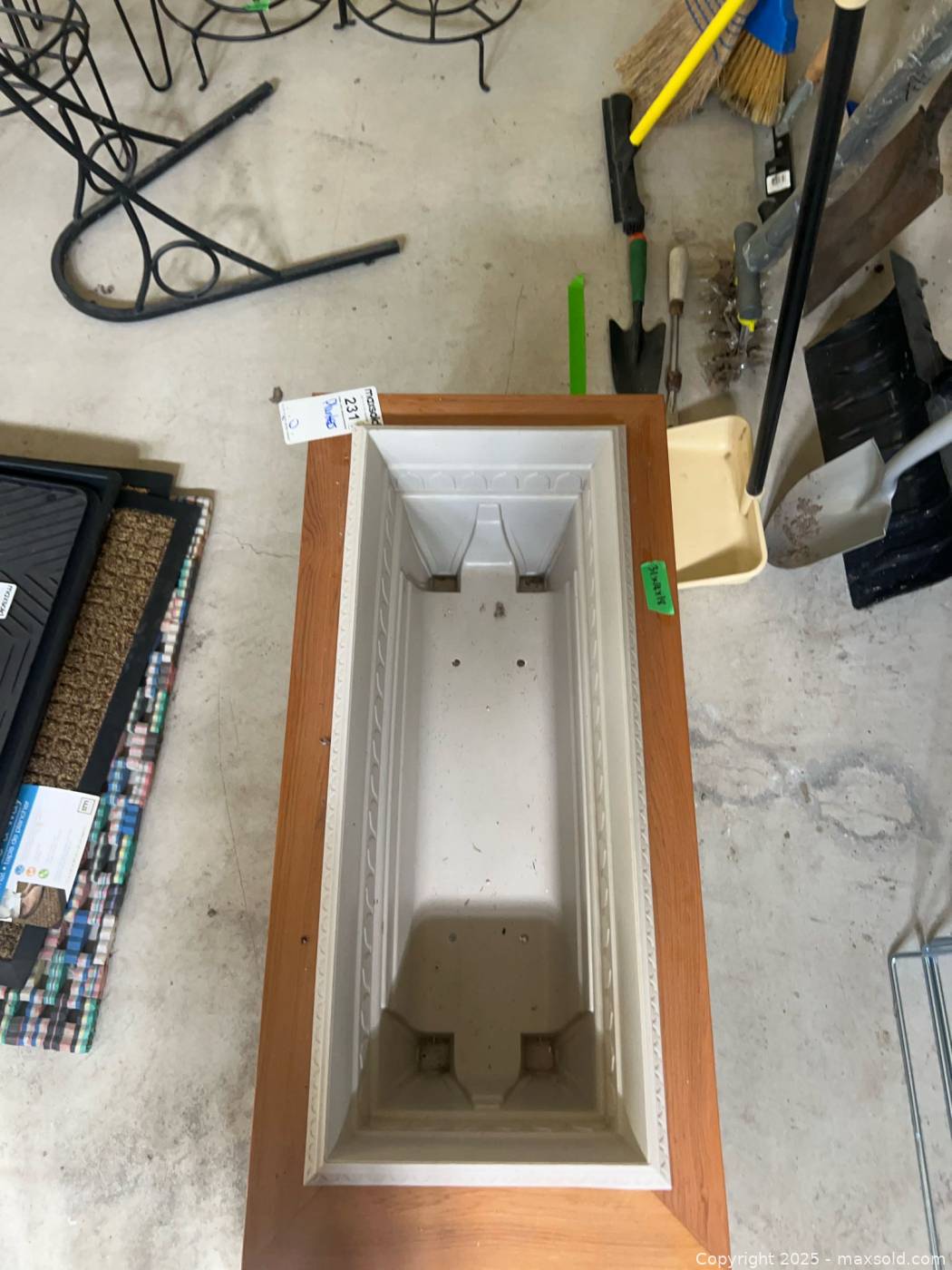 Raised wooden planter box with plastic liner | Maxsold