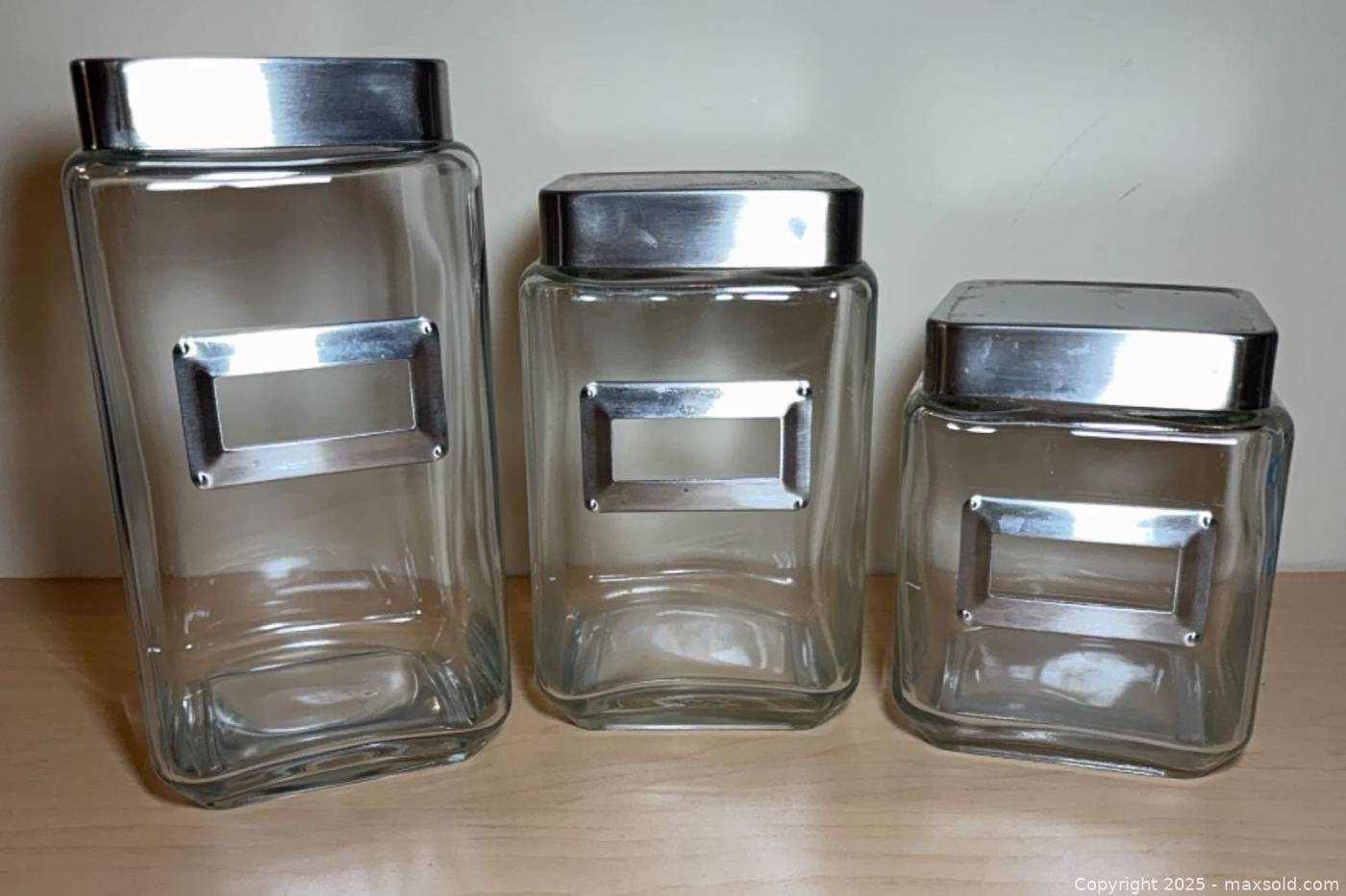 Glass square canisters with stainless lids set of 3 | Maxsold