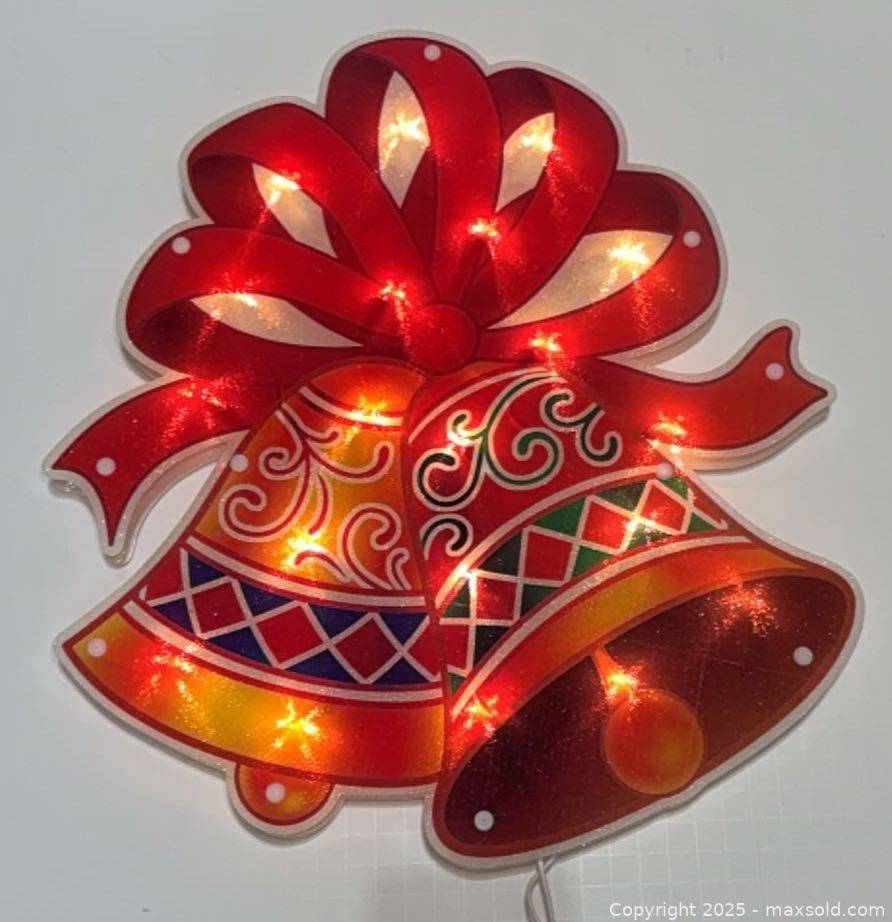 Lighted Christmas window decorations | Maxsold