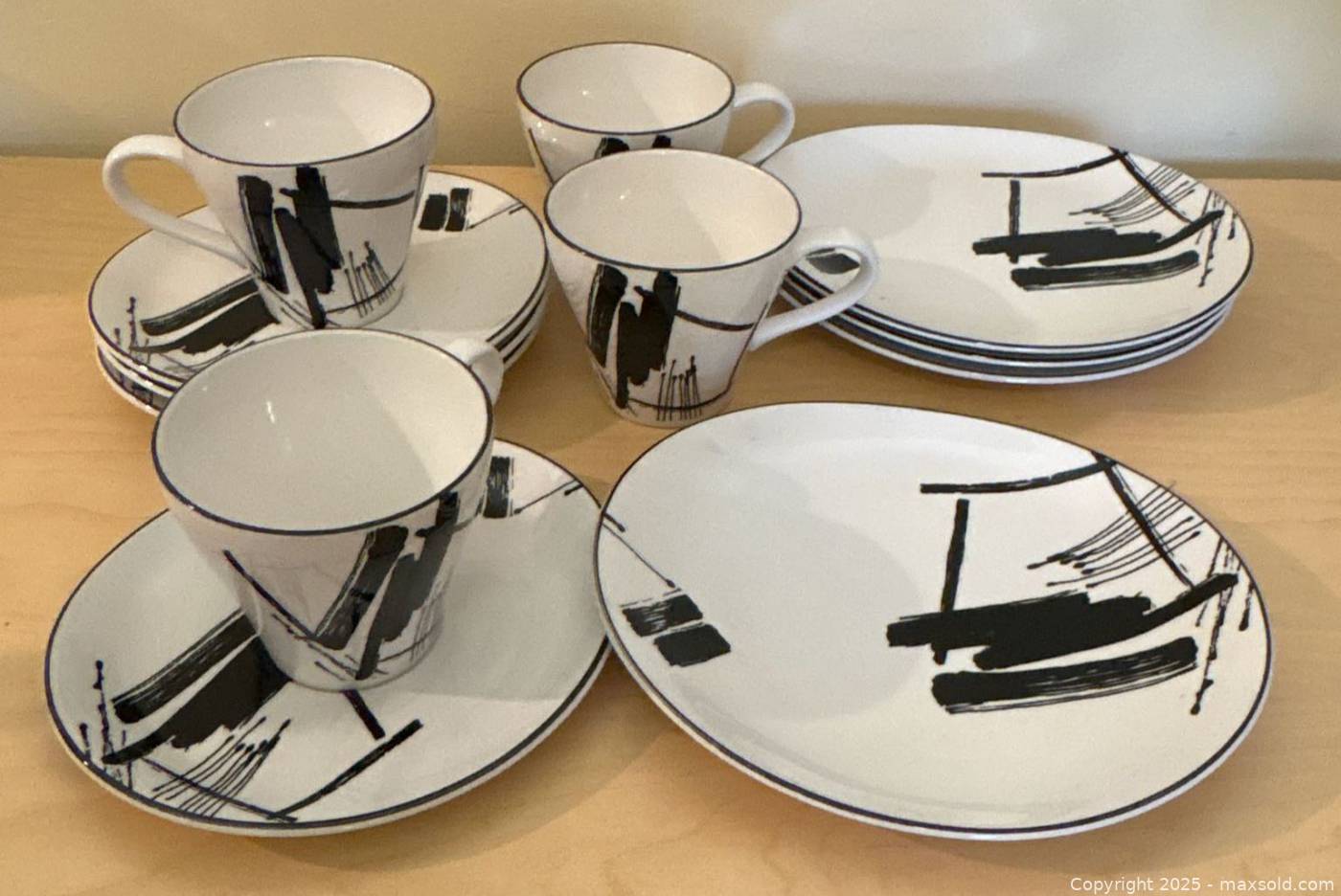 Sango Larry Laslo Calligraphy 13-Piece Dinnerware | Maxsold