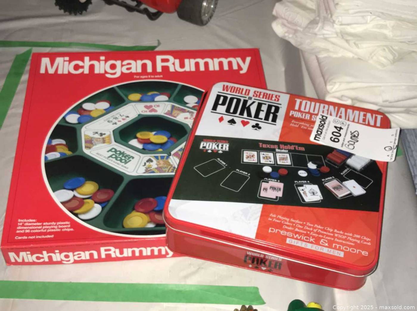 Michigan Rummy game board and WSOP Texas Hold’em tournament set | Maxsold