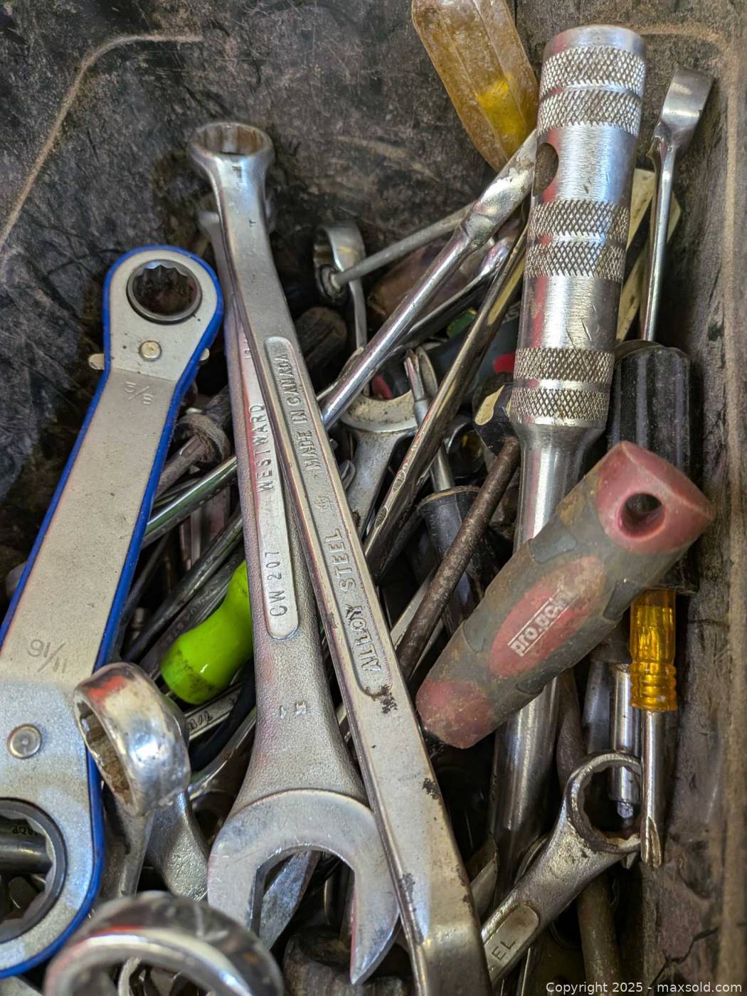 Assorted metric and SAE wrenches, hand tools, black bin | Maxsold