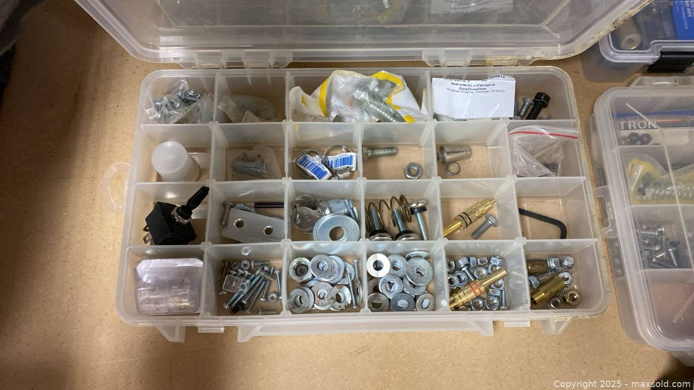Six plastic hardware organizers with assorted fasteners | Maxsold