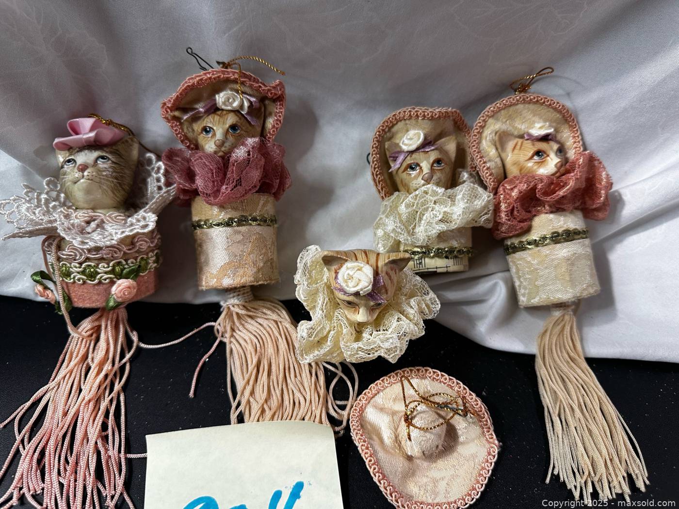 Victorian-style cat head tassel ornaments | Maxsold