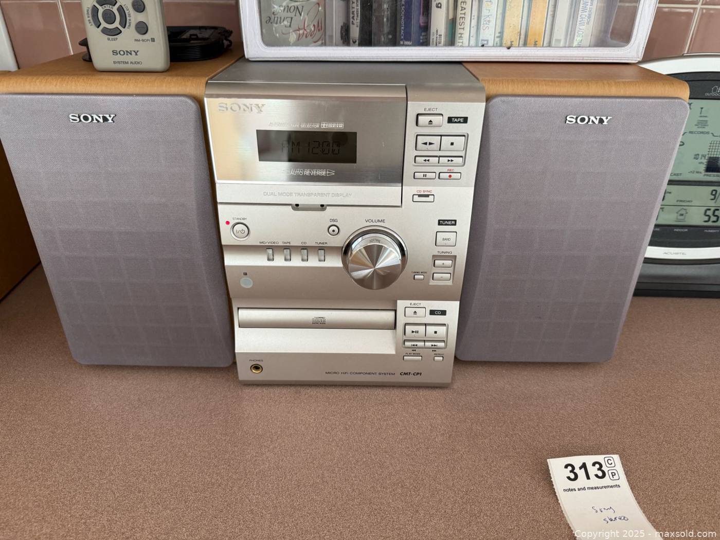 Sony CMT-CP1 stereo system, two Acu-Rite weather stations, CD holder ...