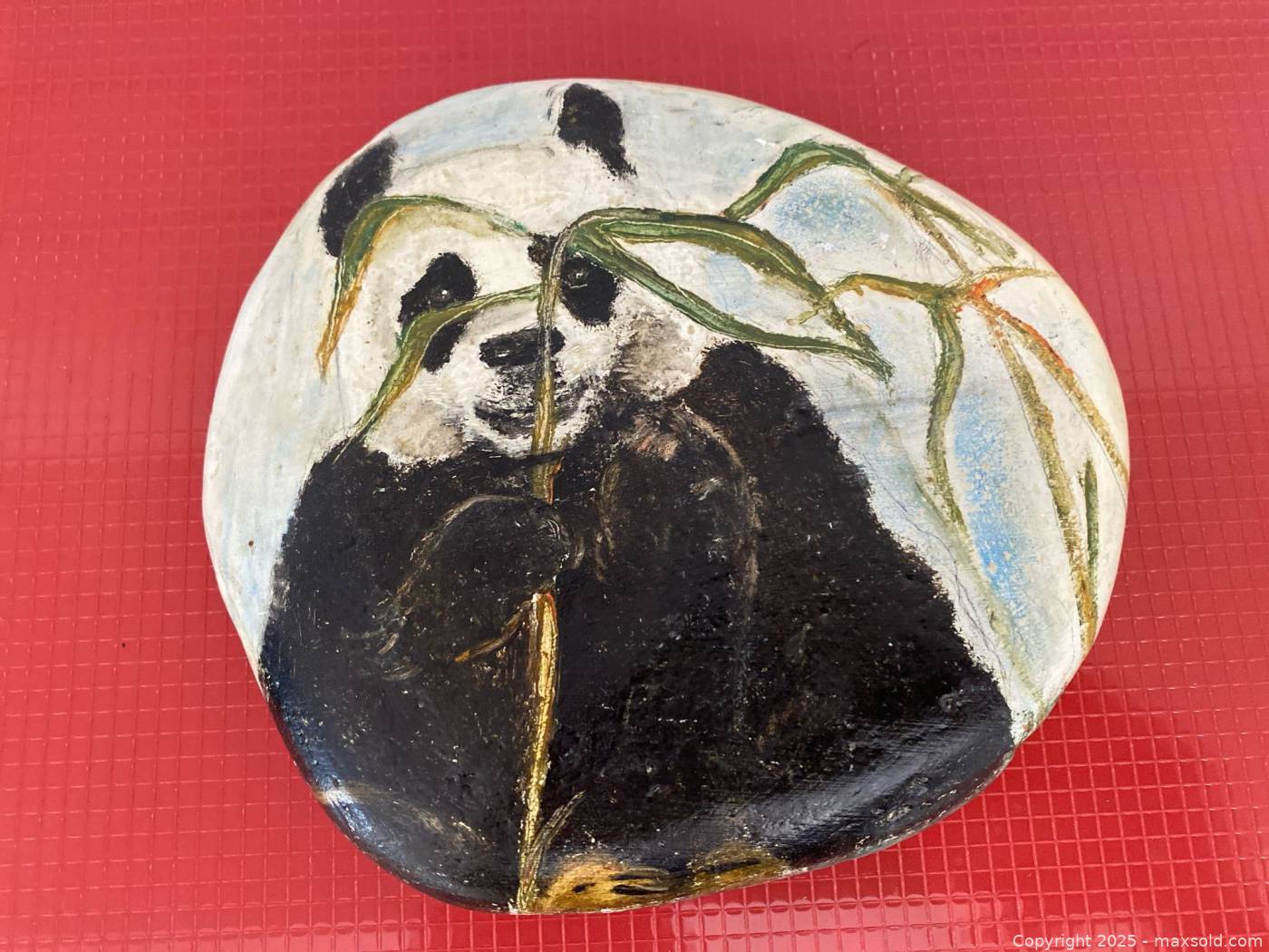 Doreen Spencer hand-painted panda stone | Maxsold