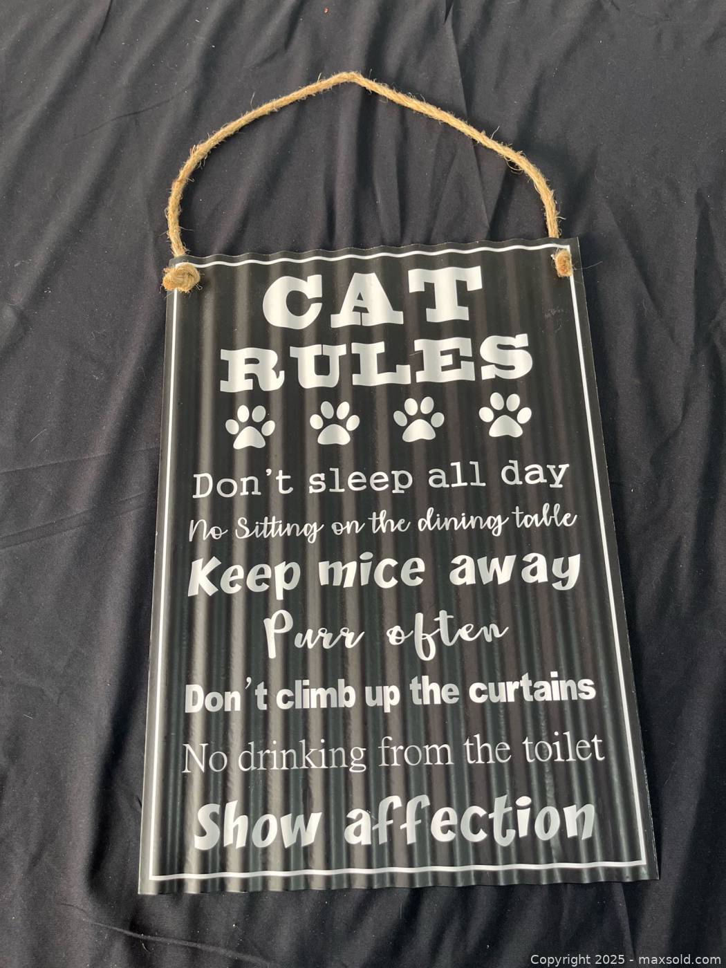 Black metal Cat Rules hanging sign | Maxsold