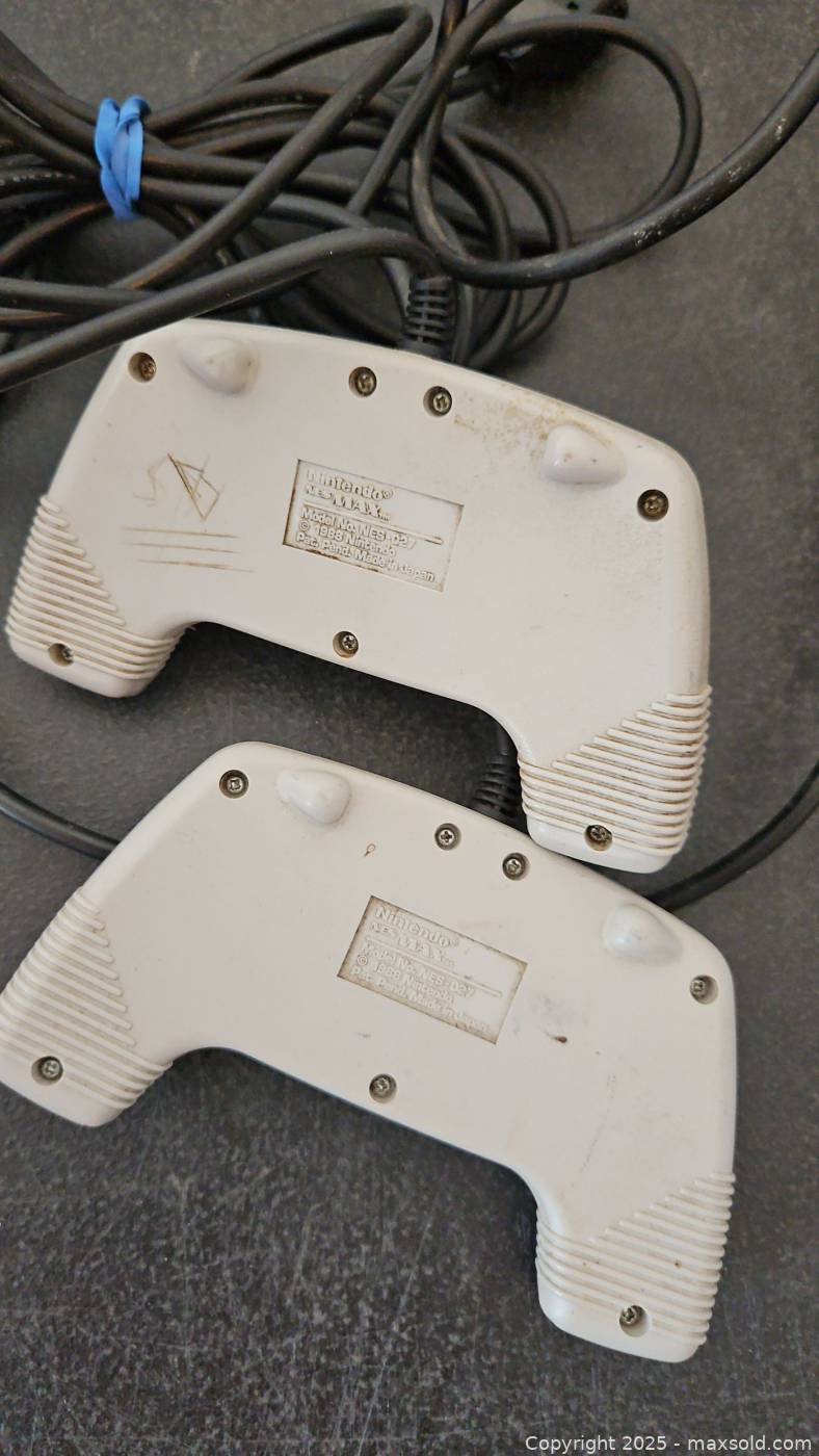 Pair of Nintendo NES Max controllers | Maxsold
