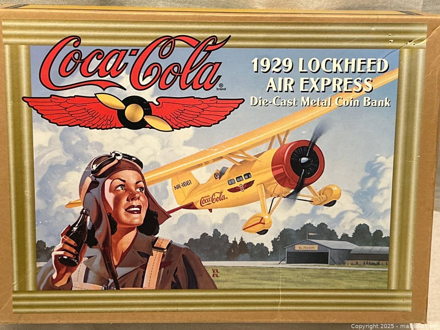 Coca-Cola 1929 Lockheed Air Express die-cast coin bank with box | Maxsold
