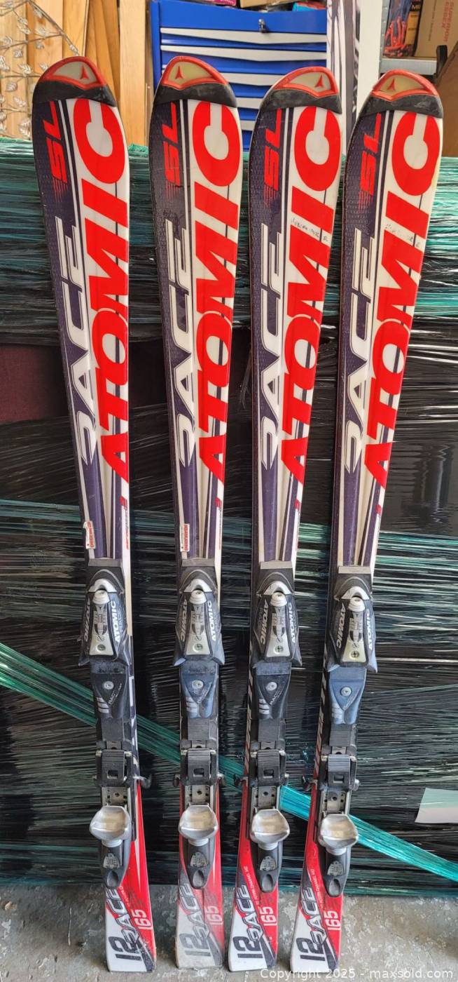 Two pairs Atomic Race SL skis with bindings | Maxsold