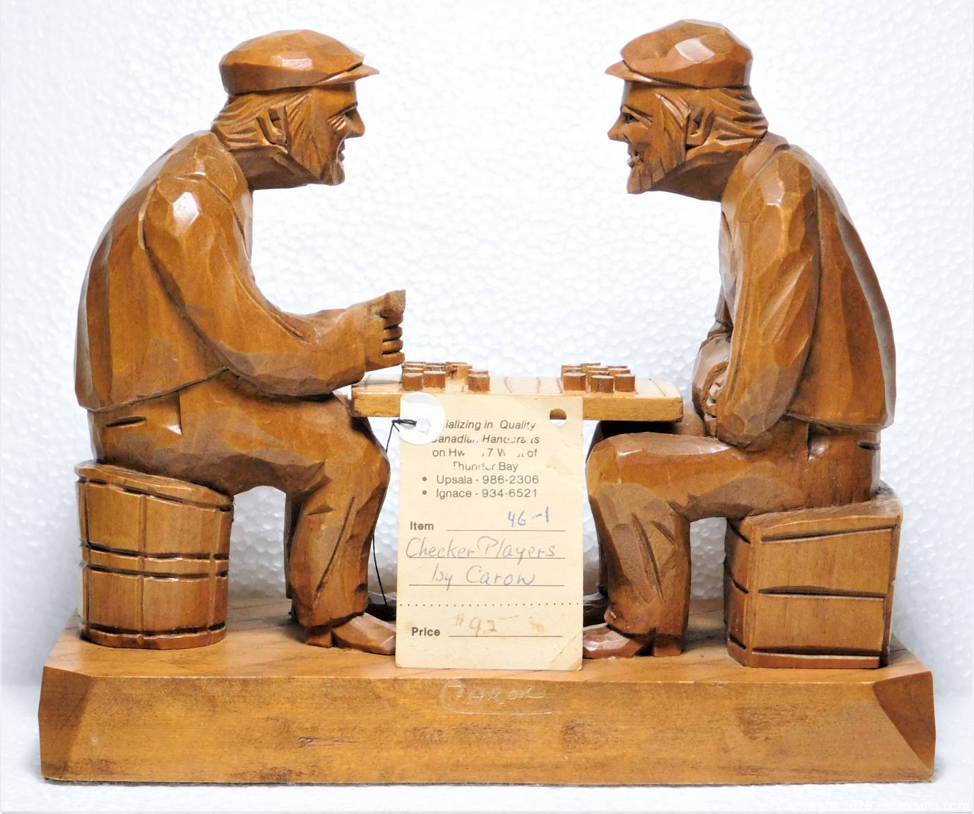 Paul E. Caron wood sculpture Checkers Players | Maxsold
