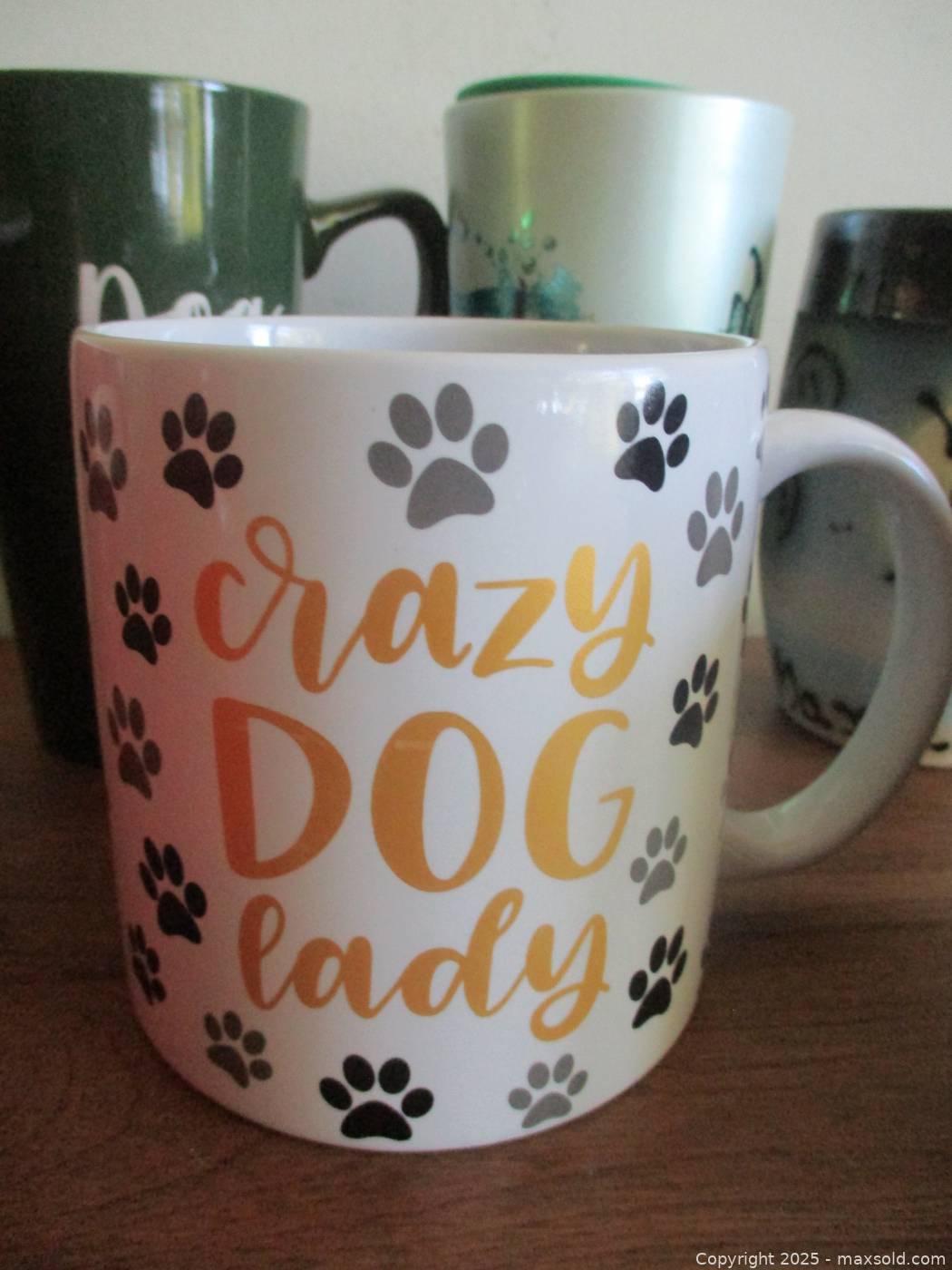 Seven ceramic coffee mugs | Maxsold