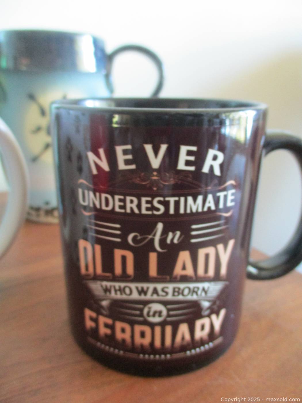 Seven ceramic coffee mugs | Maxsold