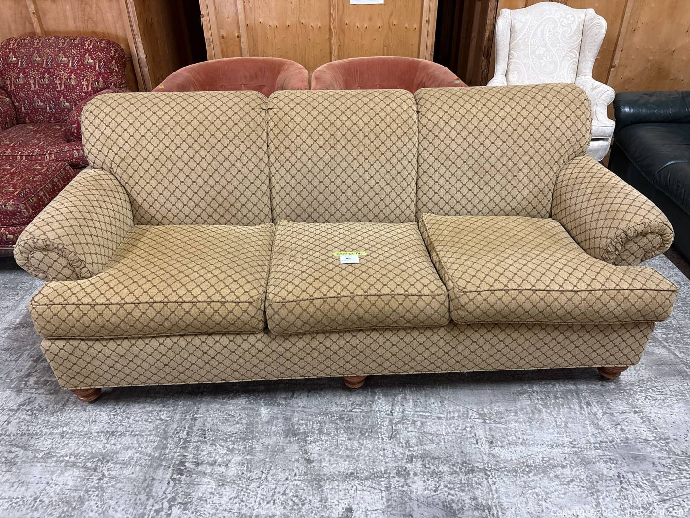 Three seat patterned fabric sofa | Maxsold