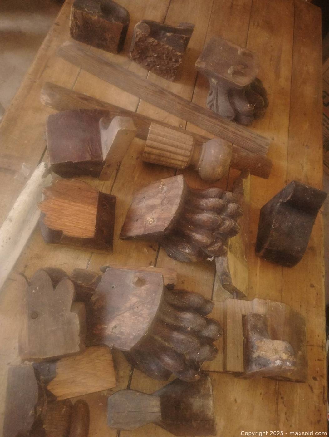 Antique architectural salvage wooden claw feet and wood blocks | Maxsold