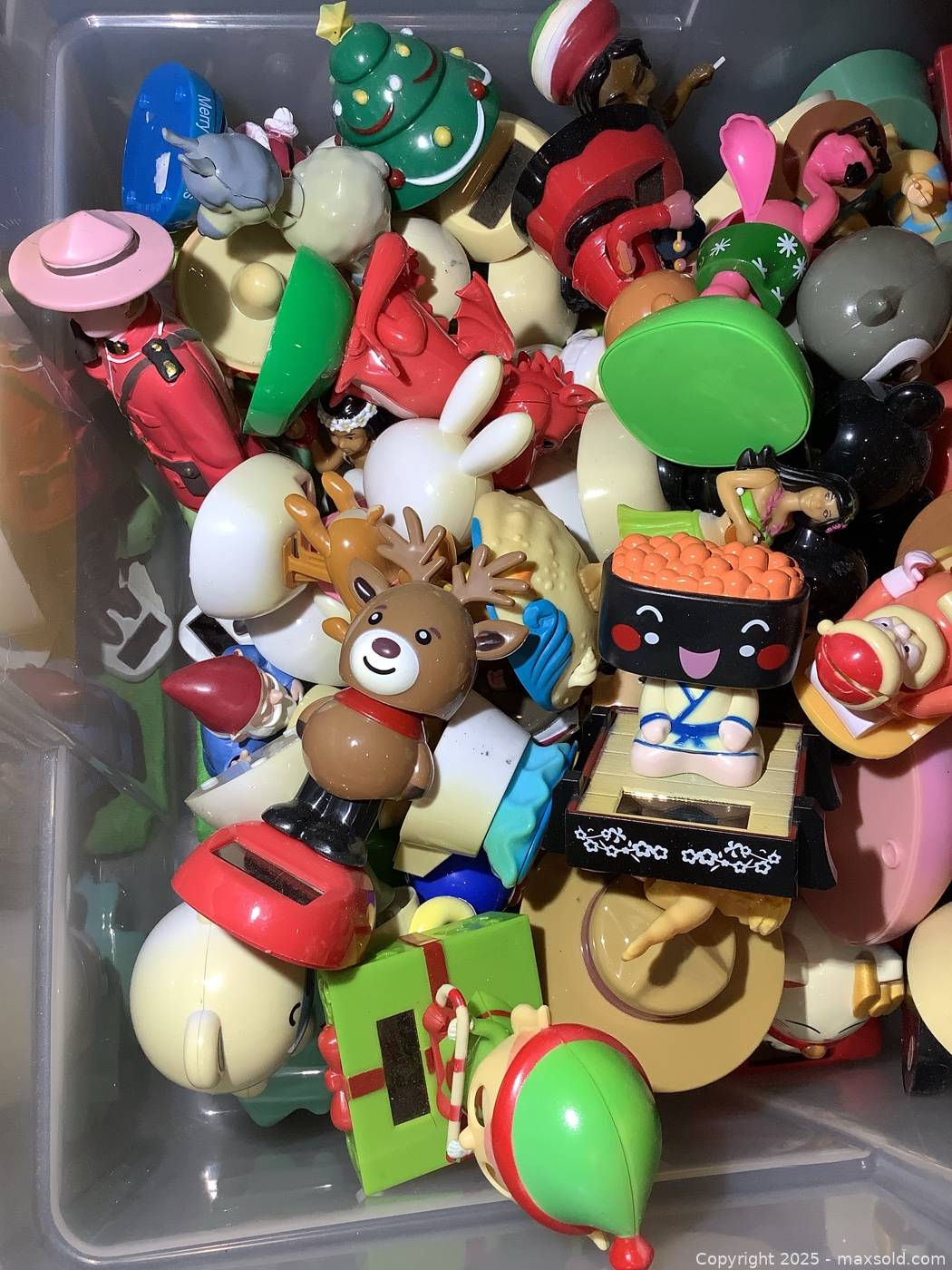 Approximately 150 Solar-Powered Nodder Figures | Maxsold