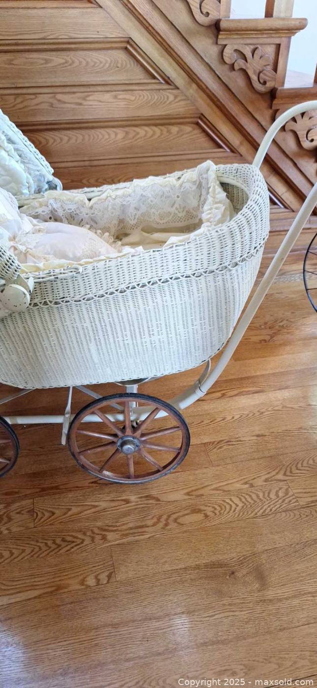 Vintage wicker baby bassinet with lace bedding | Maxsold