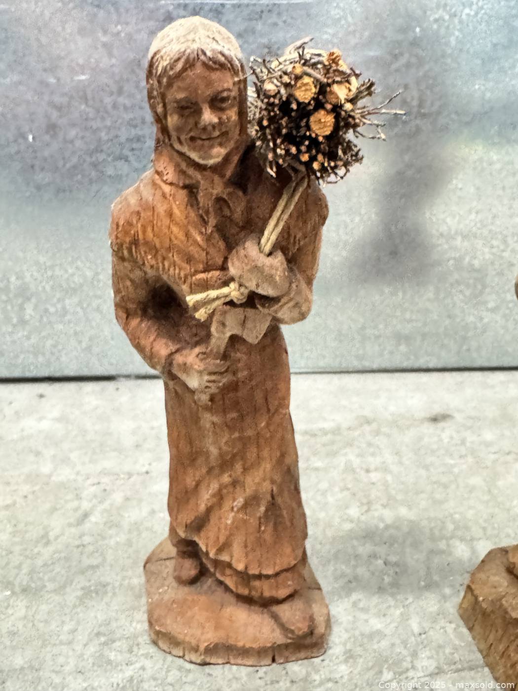 Pair carved wood alpine figurines | Maxsold