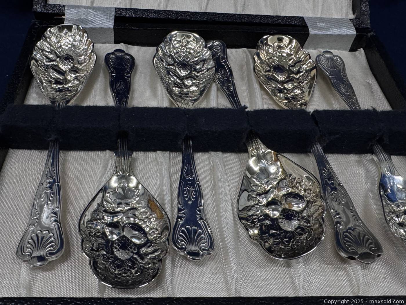 Ornate dessert spoons and small goblets in fitted cases | Maxsold