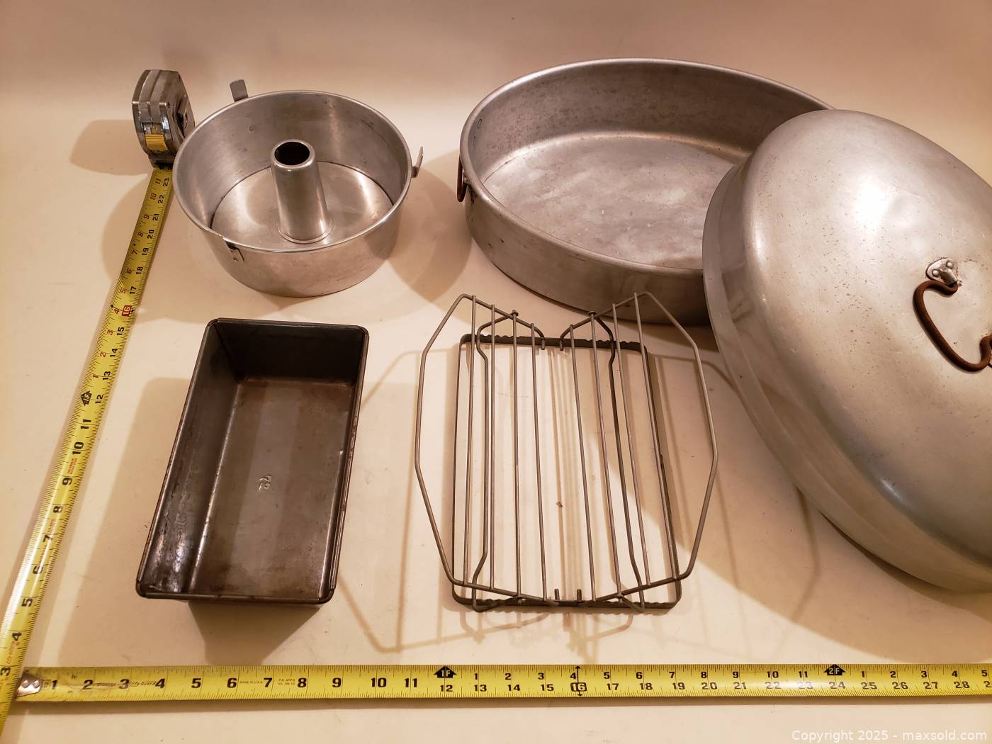 Vintage aluminum roaster, tube pan, loaf pan, rack | Maxsold