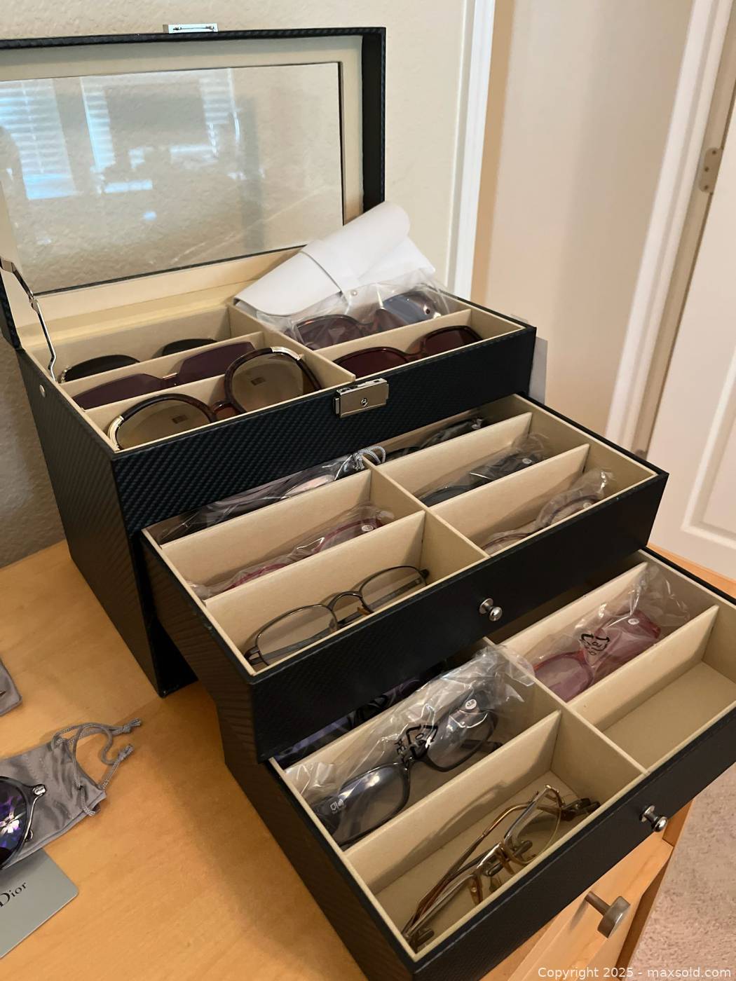 Assorted eyeglasses, sunglasses, 3-tier display case | Maxsold