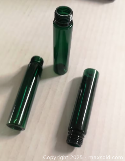 8,000 10 ml Dark Green Plastic Vials & 8,000 White Caps | Maxsold
