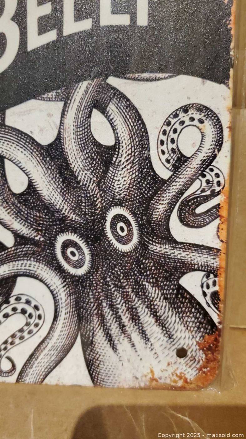 Kraken Black Spiced Rum metal wall sign 8 x 12 in | Maxsold