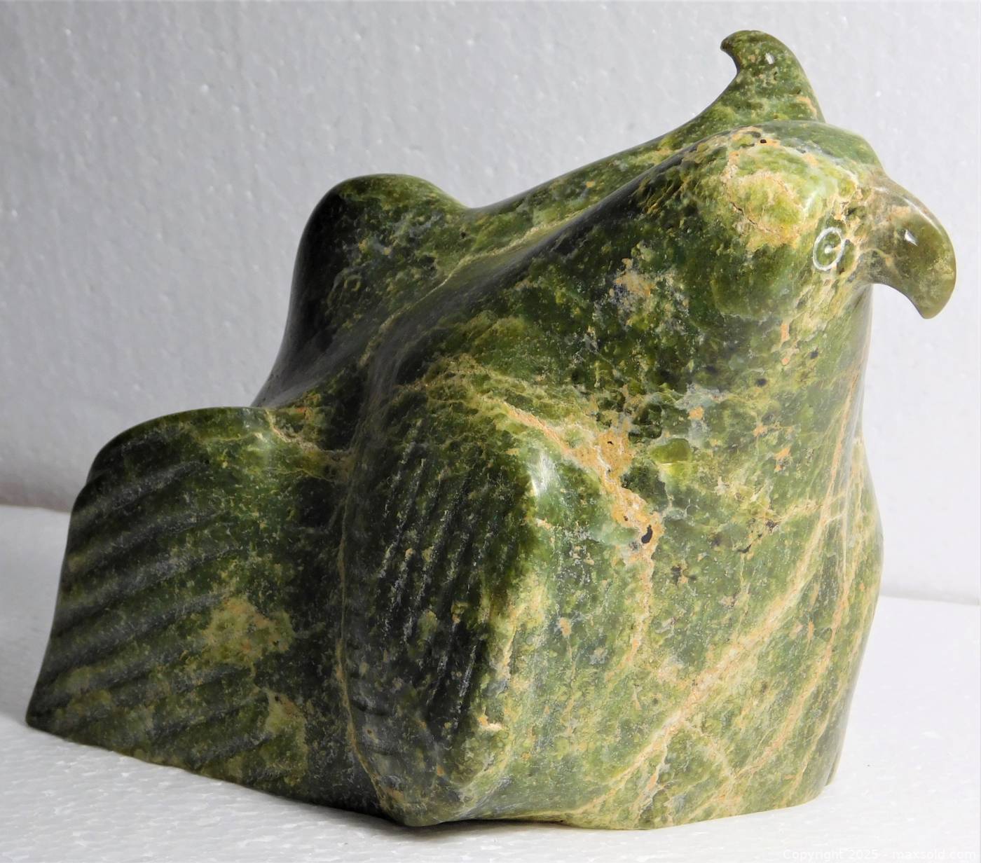 Green serpentine Inuit bird sculpture | Maxsold