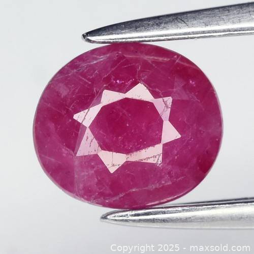 0.69ct 5.5x4.8mm Oval Purplish Red Ruby | Maxsold