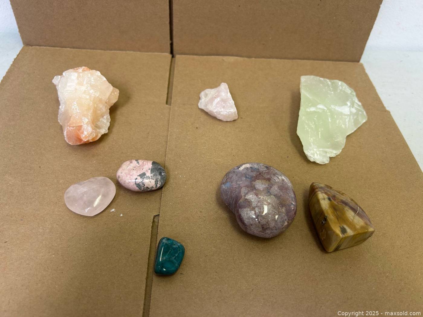 Assorted crystals and tumbled stones | Maxsold