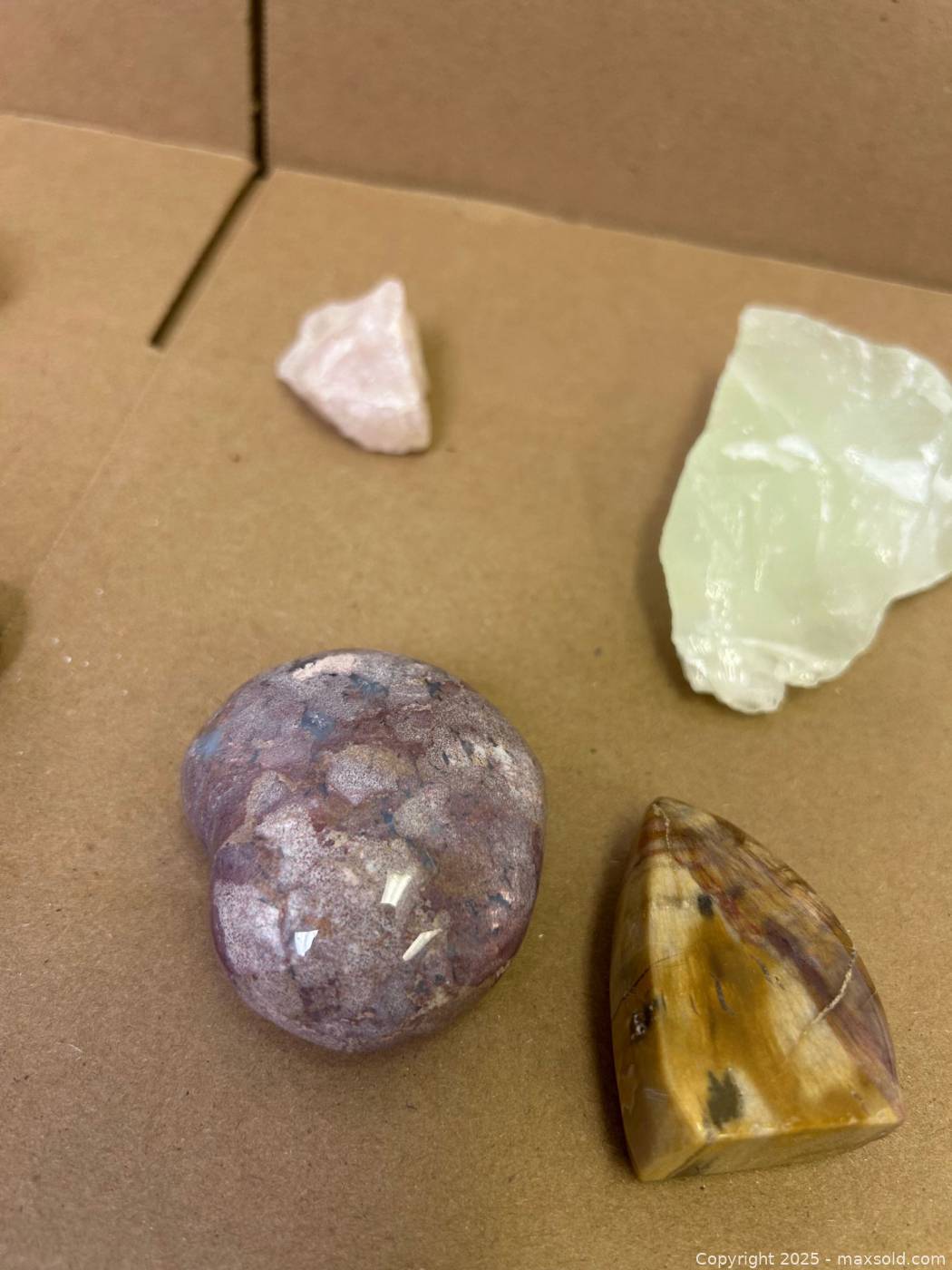 Assorted crystals and tumbled stones | Maxsold