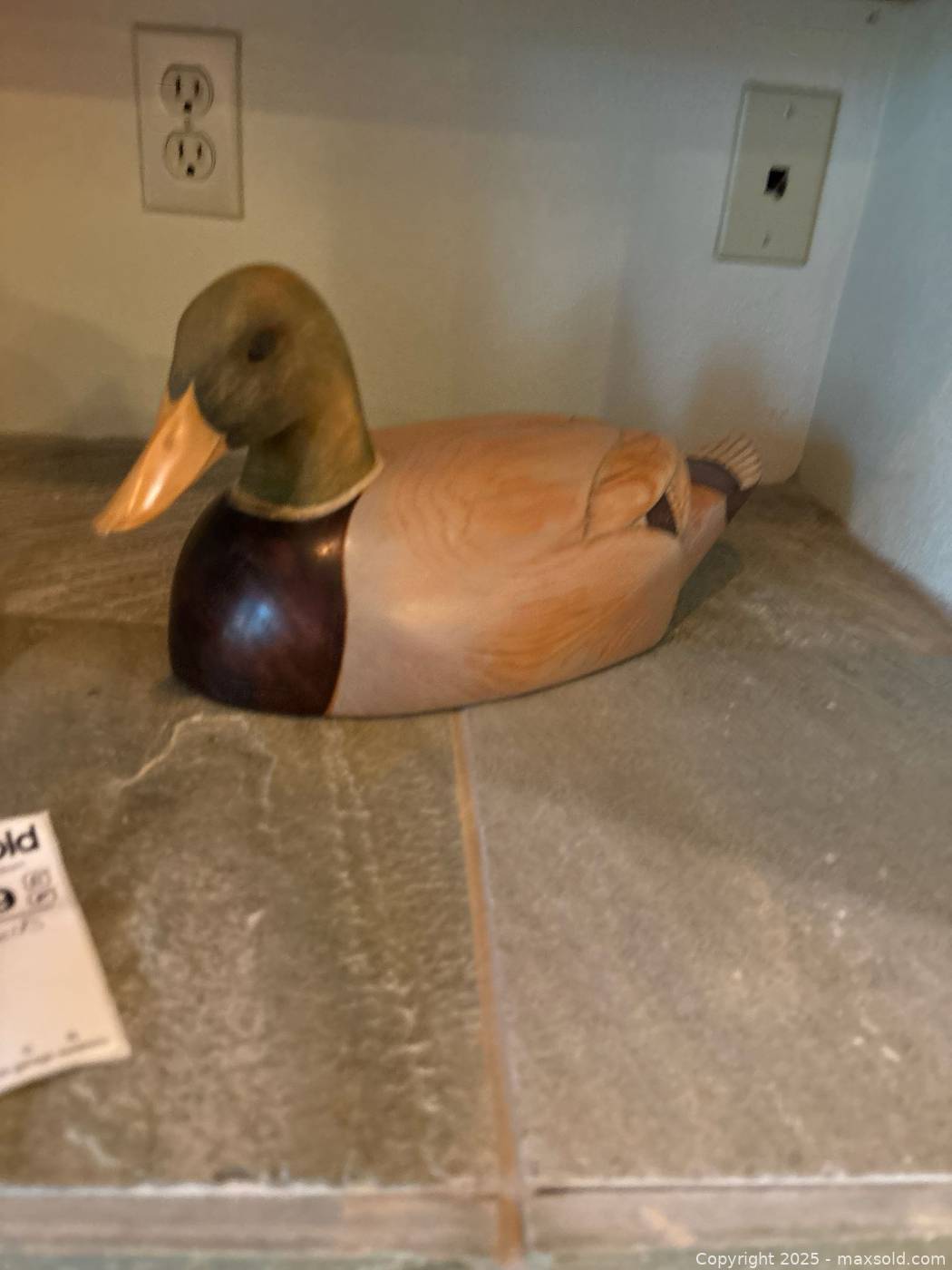 Carved Wood Mallard and Black Stone Ducks | Maxsold