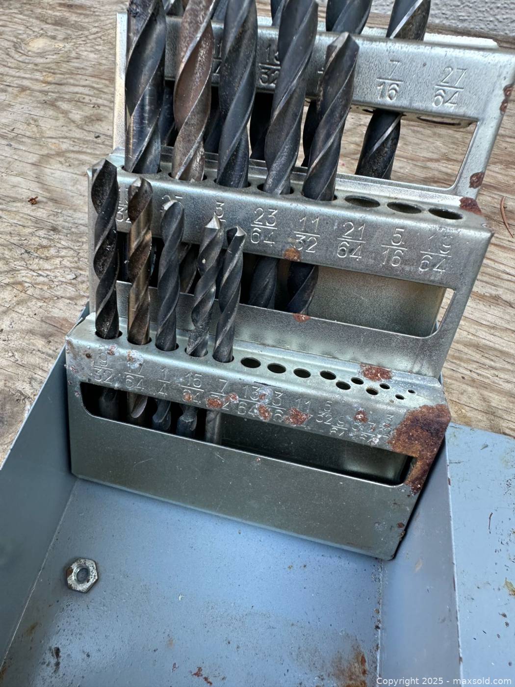 Drill bit index with assorted bits | Maxsold